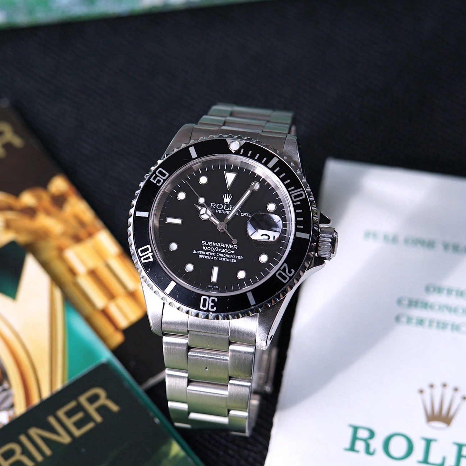 Rolex submariner 16610 "Swiss only" dial box & papers